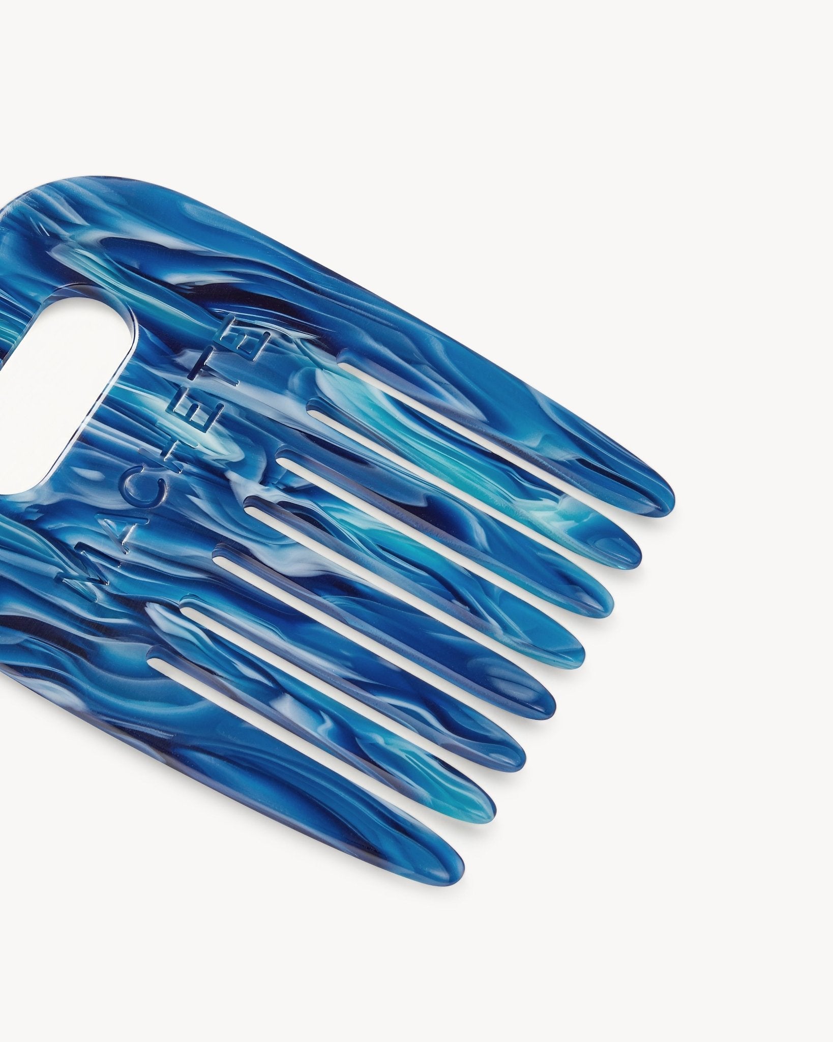 No. 4 comb hair pick shape in capri blue acetate. – MACHETE